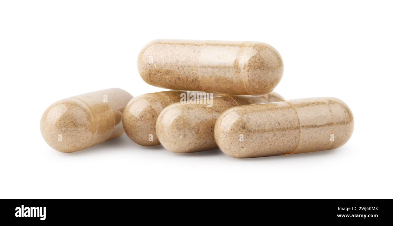 Pile of vitamin capsules isolated on white Stock Photo - Alamy