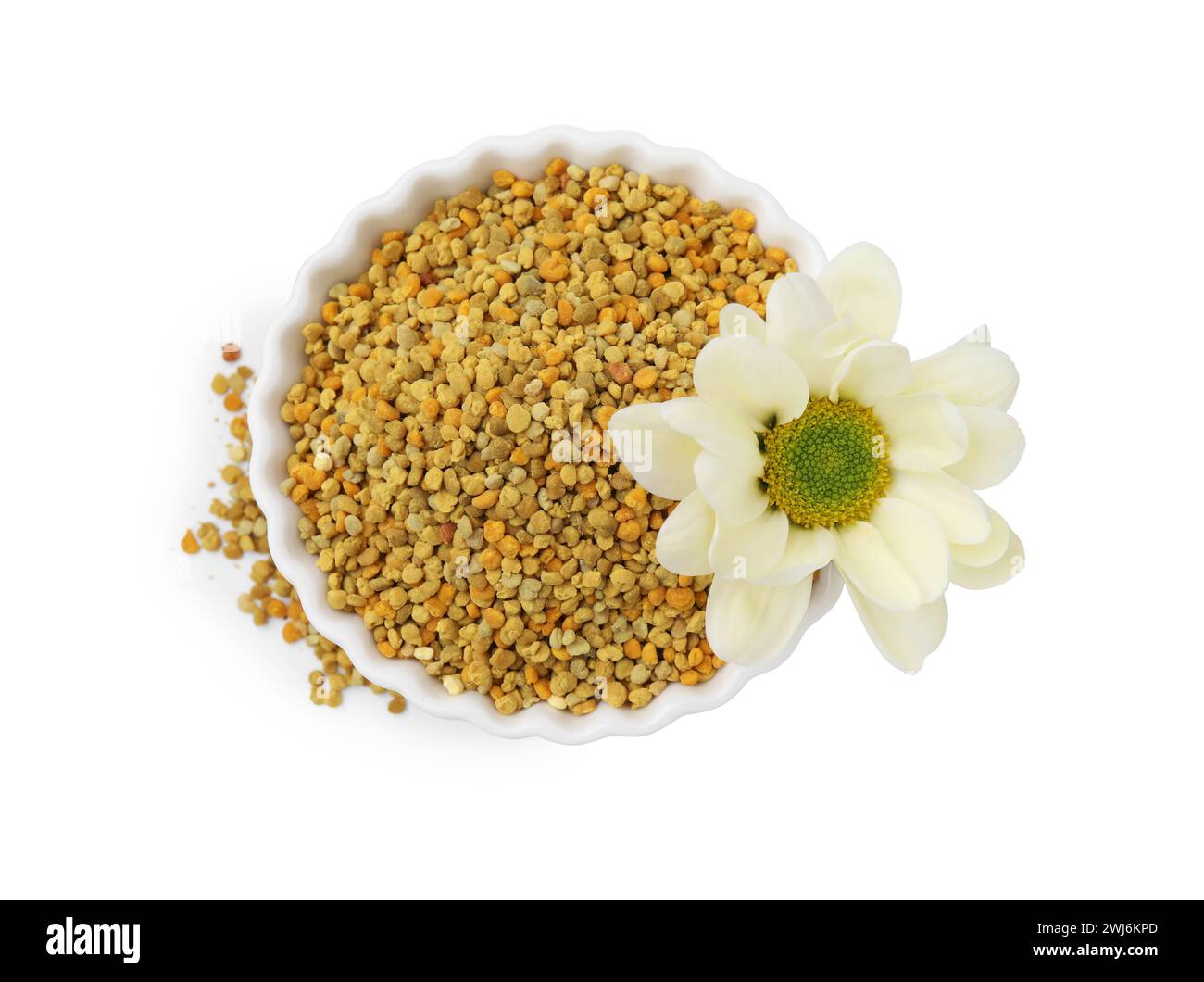 Fresh bee pollen granules in bowl and flower isolated on white, top ...