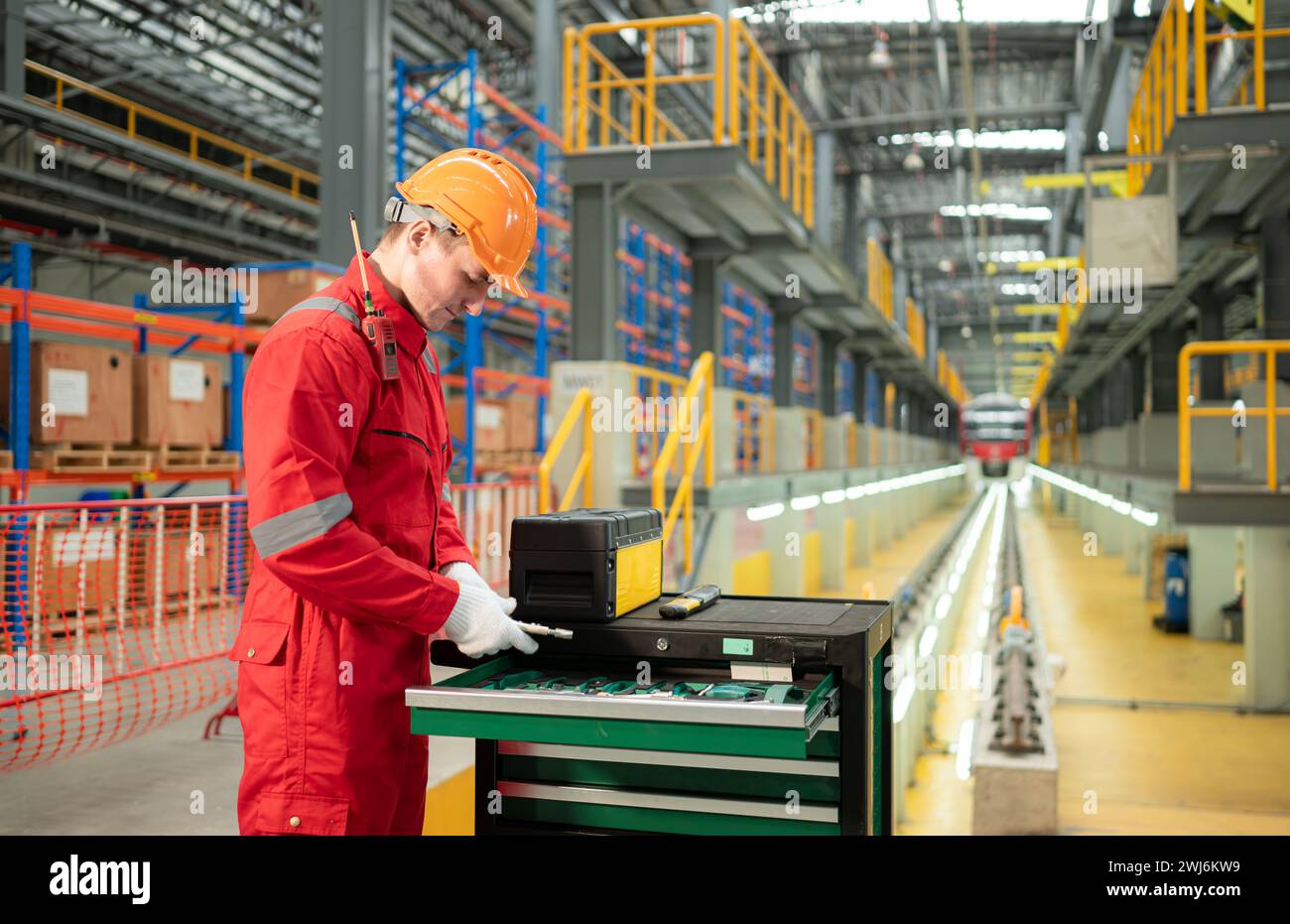 Portrait of engineer using repair tools of the electric train industry ...