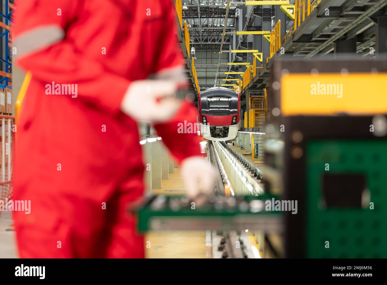 Picture of engineer using repair tools of the electric train industry ...