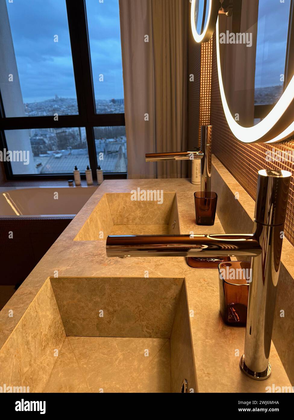 Modern sinks and faucets in hotel bathroom Stock Photo - Alamy