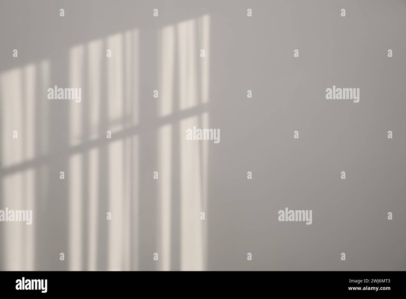 Light and shadows from window on wall indoors Stock Photo - Alamy