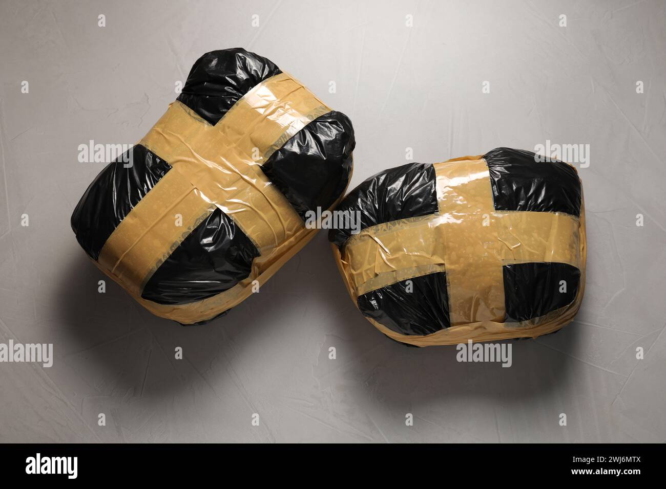 Packages with narcotics on grey textured table, top view Stock Photo ...