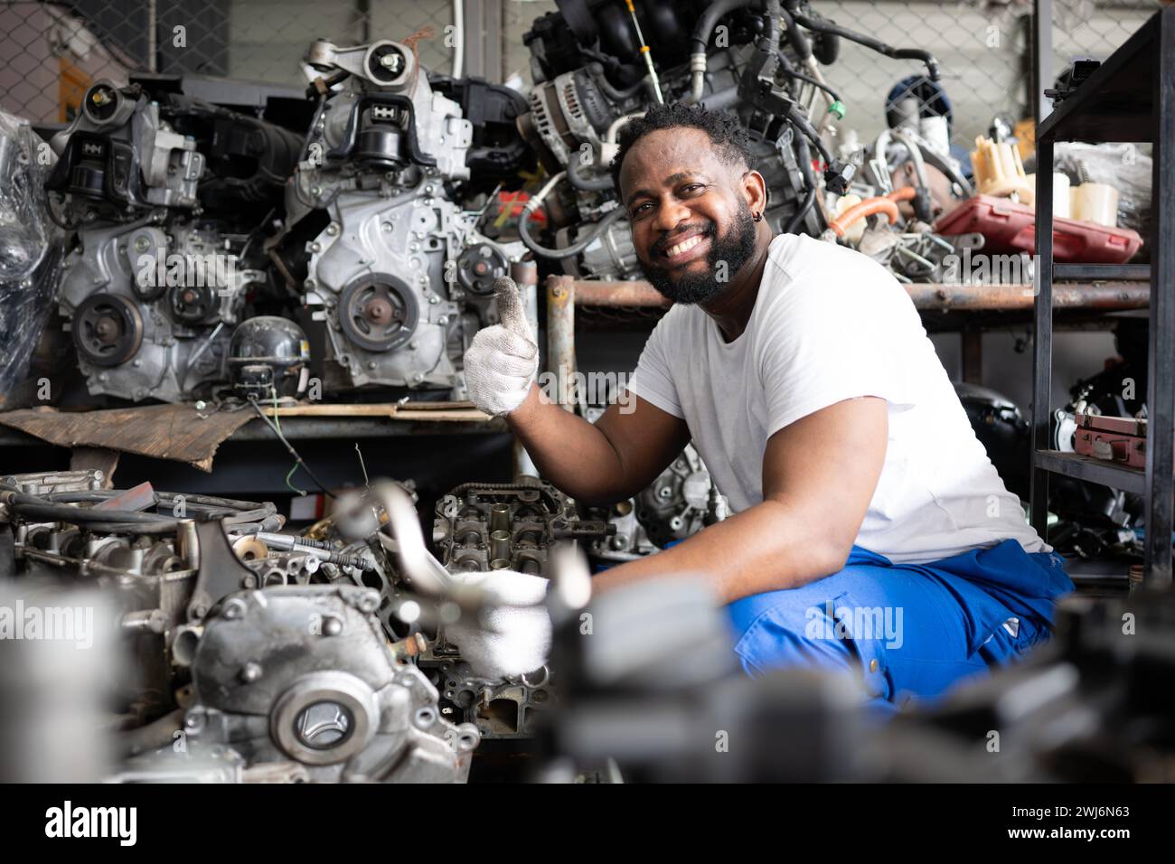 Men repairing car engine in auto repair shop, Selective focus Stock ...