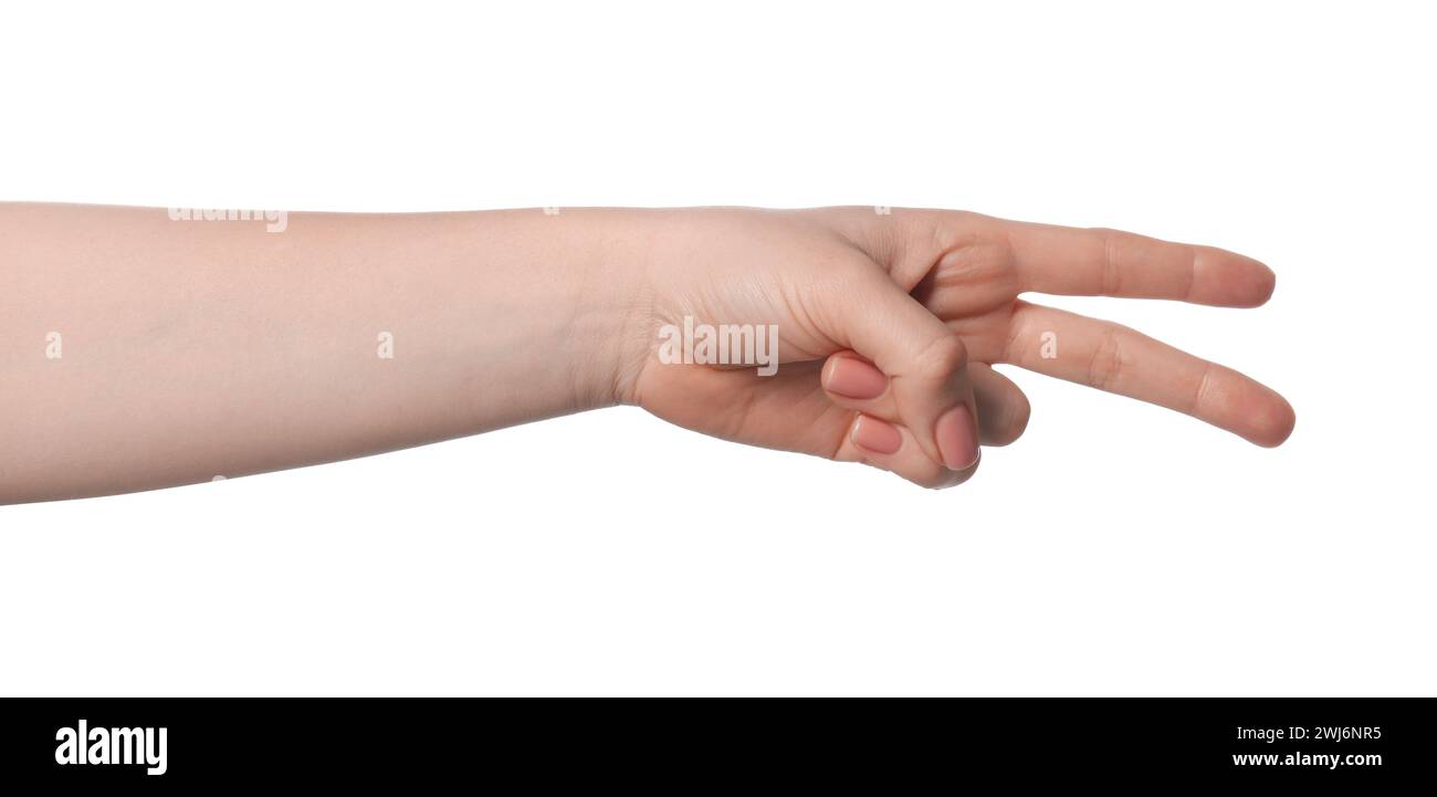 Playing rock, paper and scissors. Woman making scissors with her ...
