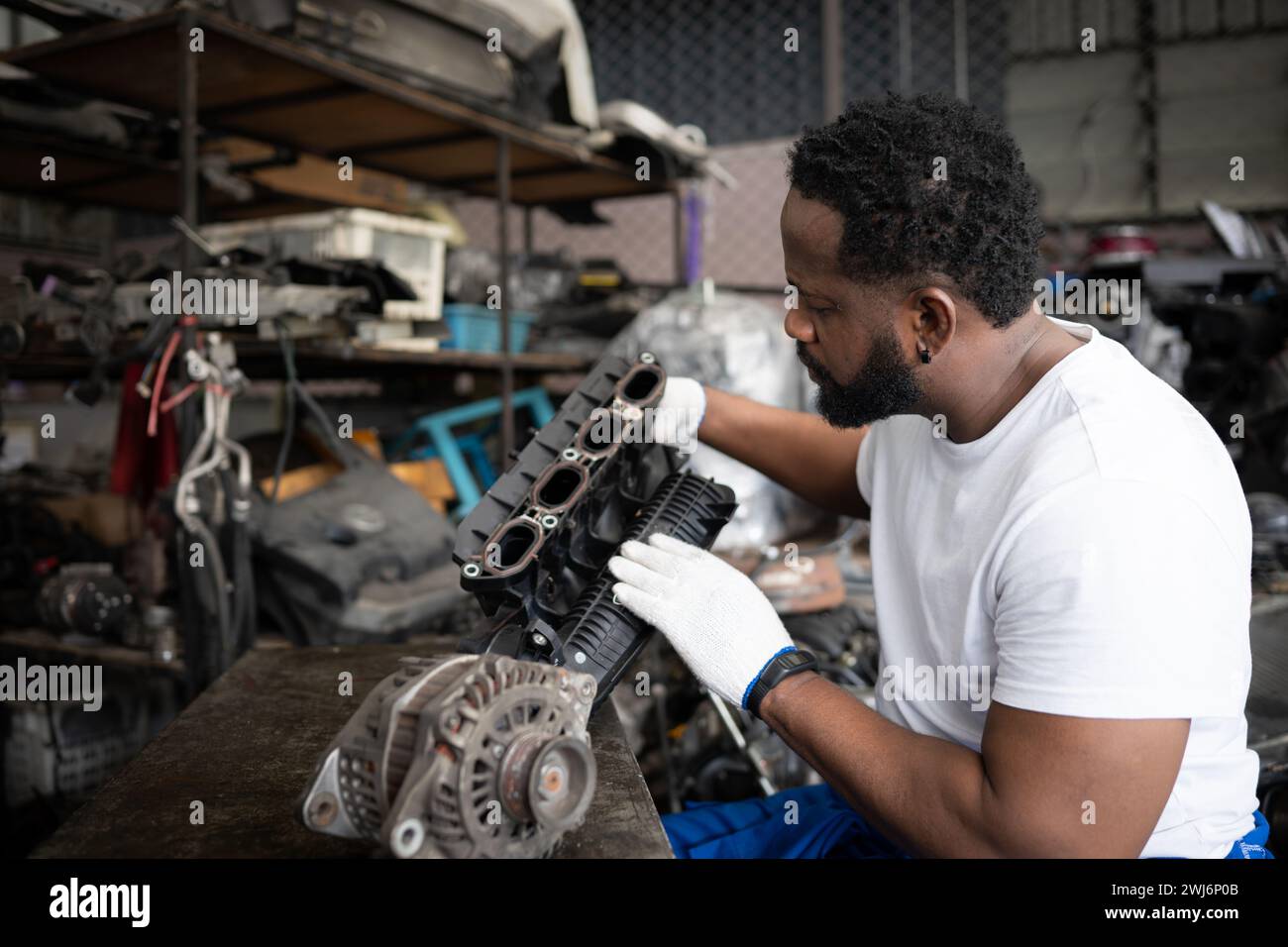 Men repairing car engine in auto repair shop, Selective focus Stock ...