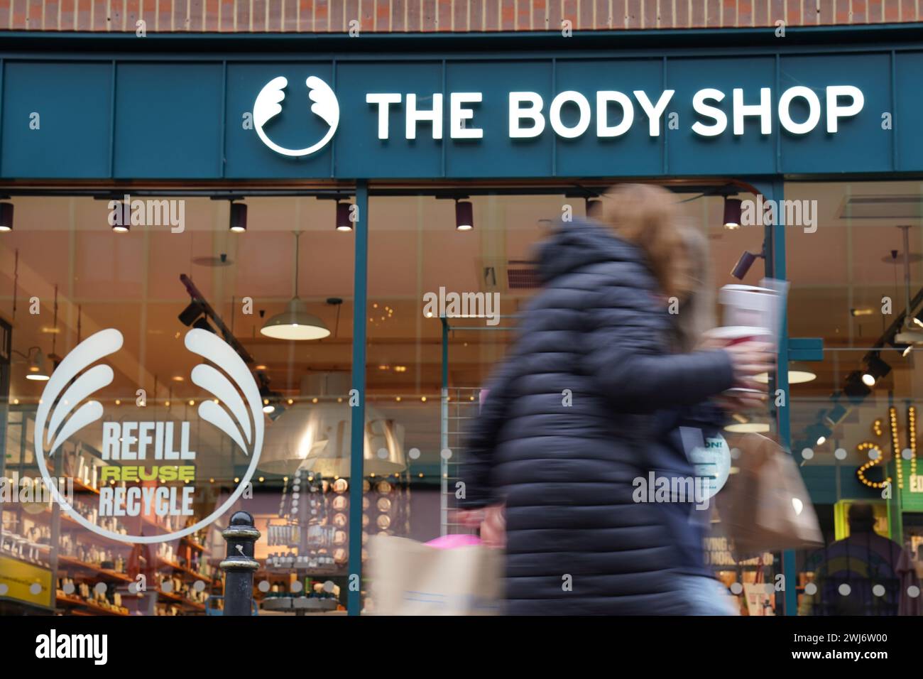 People walk past a Body Shop store in Canterbury. The Body Shop has ...