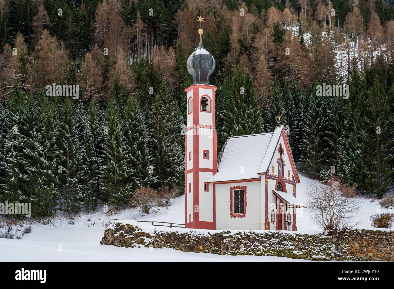Winter view of Church of St. Johann in Ranui, Dolomites, Villnoss-Funes ...