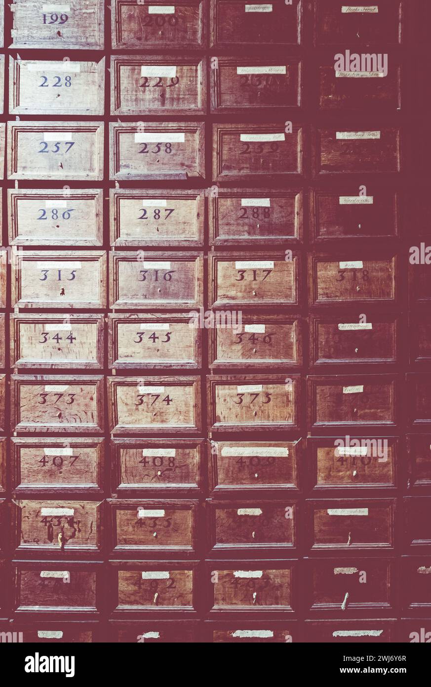 A wall of numbered estate storage drawers at Hardwick Hall Stock Photo ...