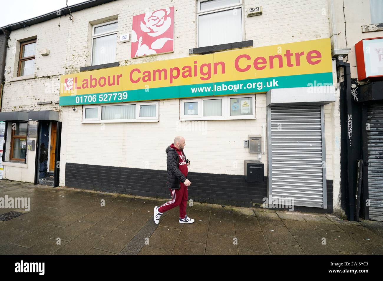 A man walks past the Labour Campaign Centre in Rochdale, Greater ...
