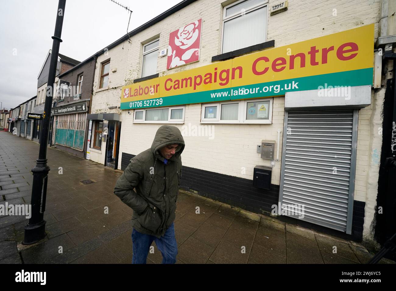 A man walks past the Labour Campaign Centre in Rochdale, Greater ...