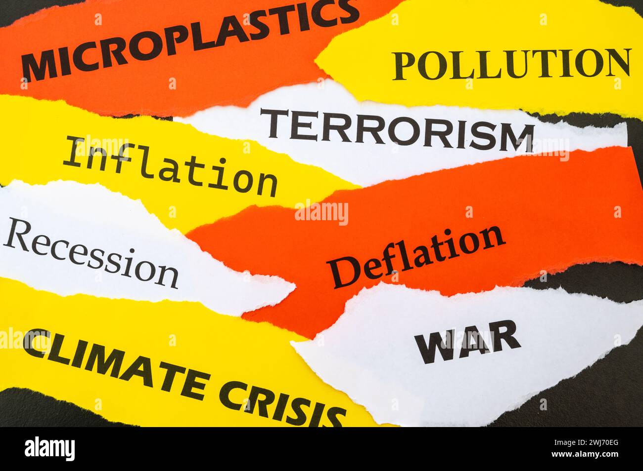 Current affairs, sheets of various colors with words: economic crisis ...