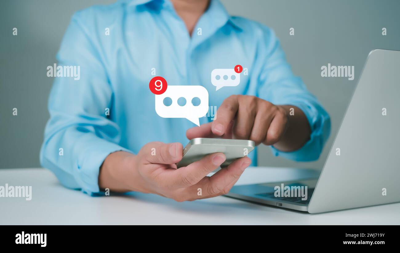 man using smartphone typing live chat chatting on application communication digital web and ...