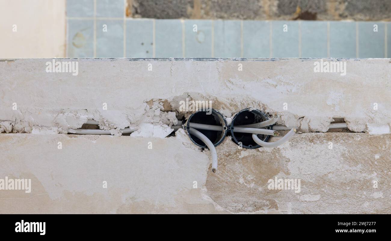 Electrical wiring in the old house flush-mounted Stock Photo - Alamy