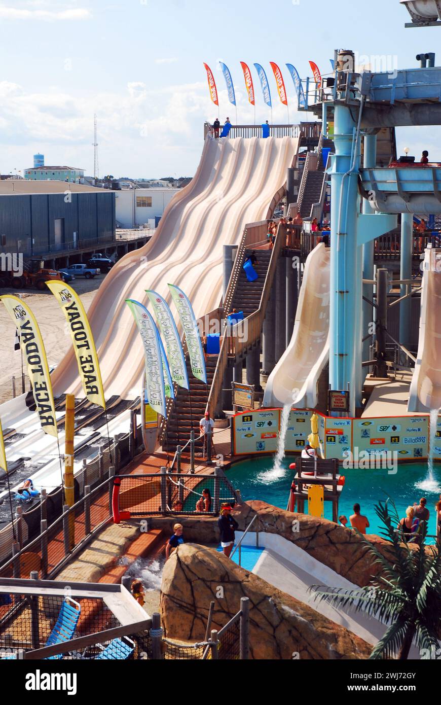 An aerial view takes in the large slide and the amusement park rides on ...