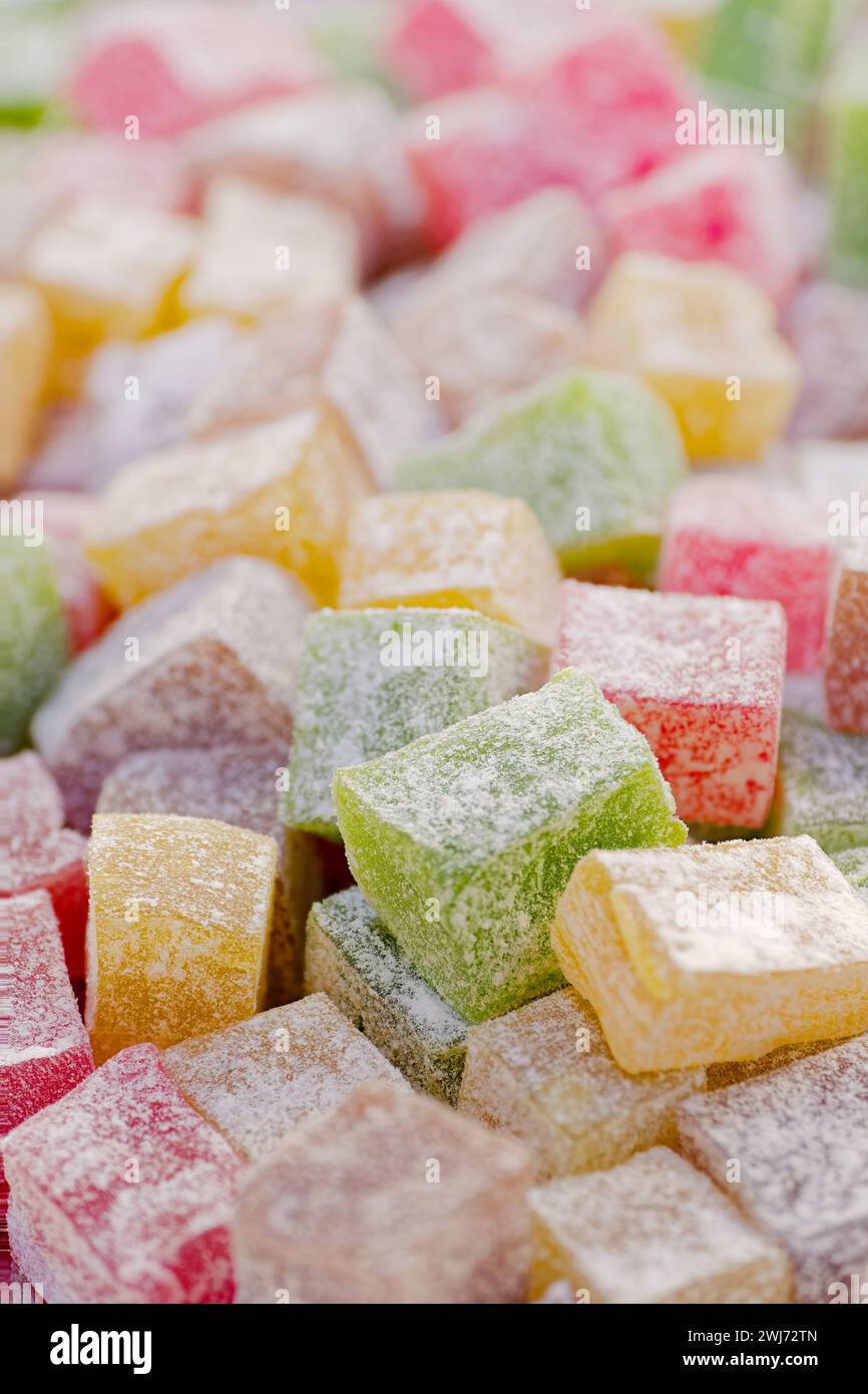 Multicolour cubes of rahat lokum, traditional Turkish dessert, abstract ...