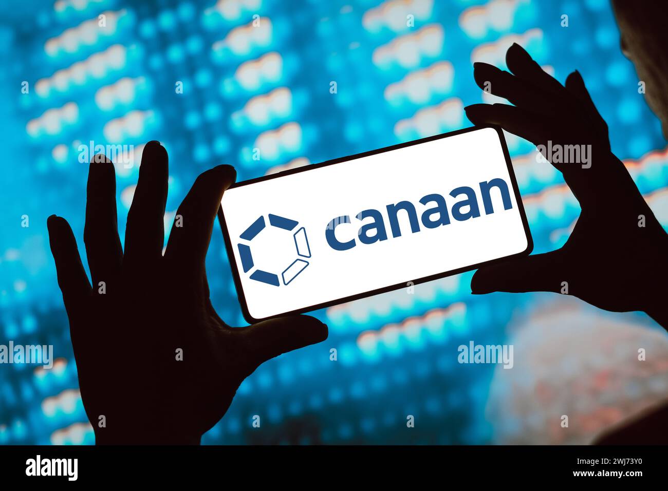 In this photo illustration, the Canaan Inc. logo is displayed on a ...