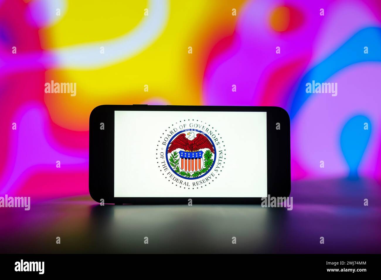 In this photo illustration, the Federal Reserve logo is seen displayed ...