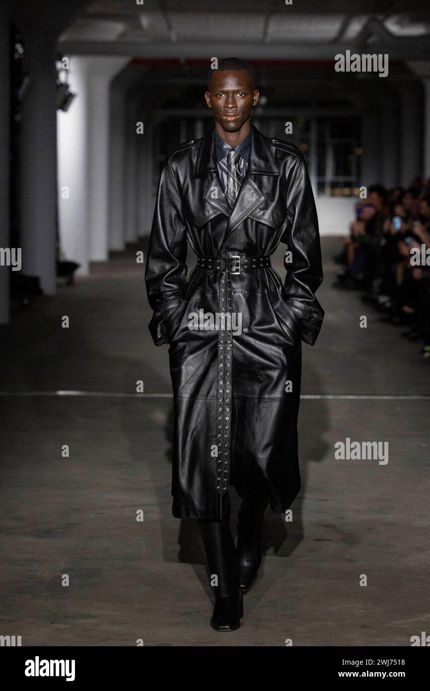 Model Khadim Sock walks on the runway at the Ludovic de Saint Sernin ...