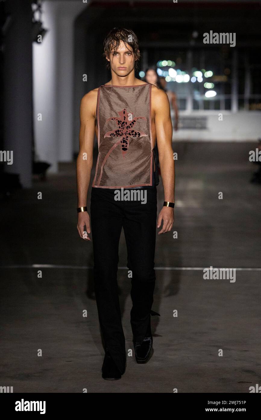 A model walks on the runway at the Ludovic de Saint Sernin fashion show ...