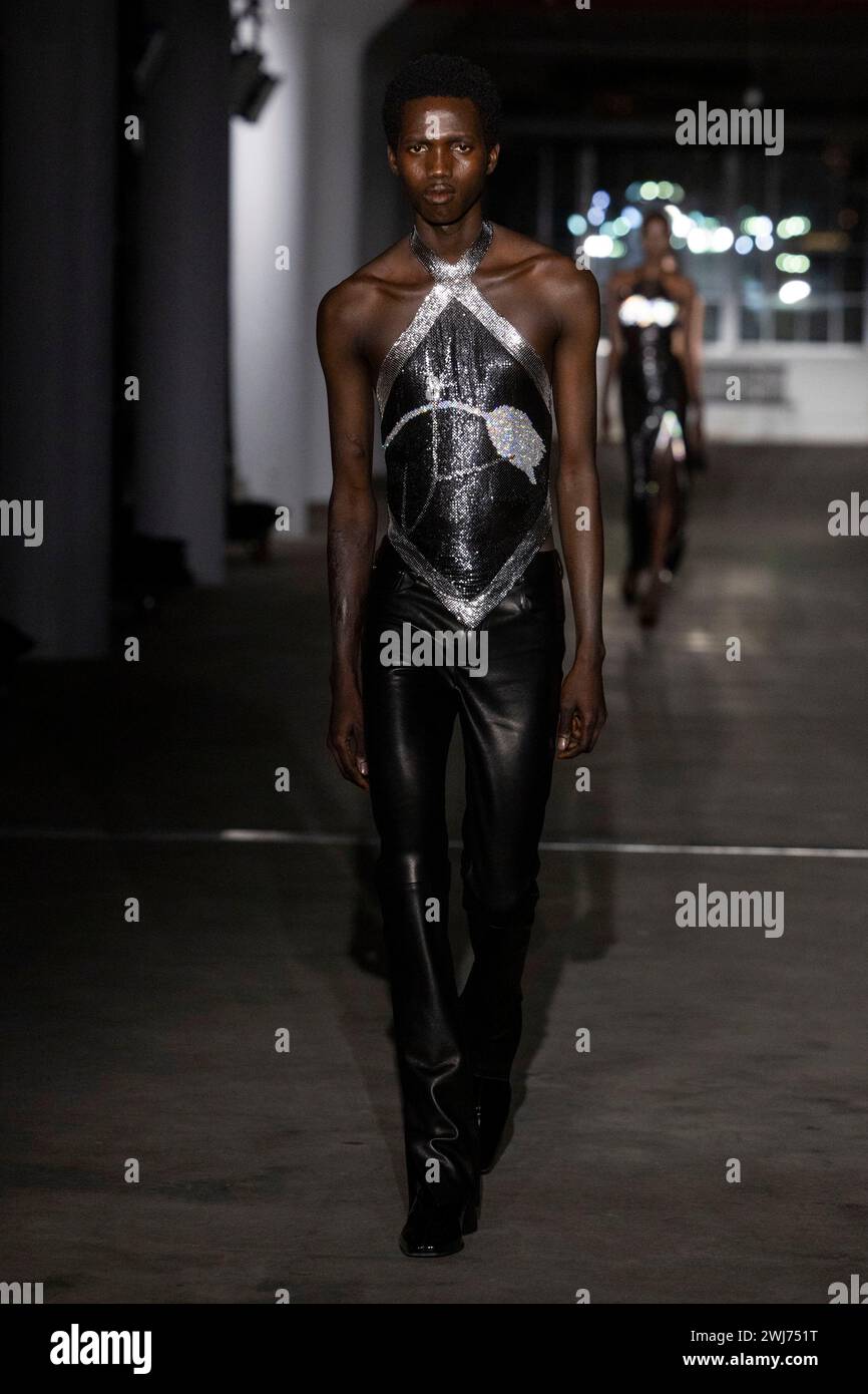 A model walks on the runway at the Ludovic de Saint Sernin fashion show ...