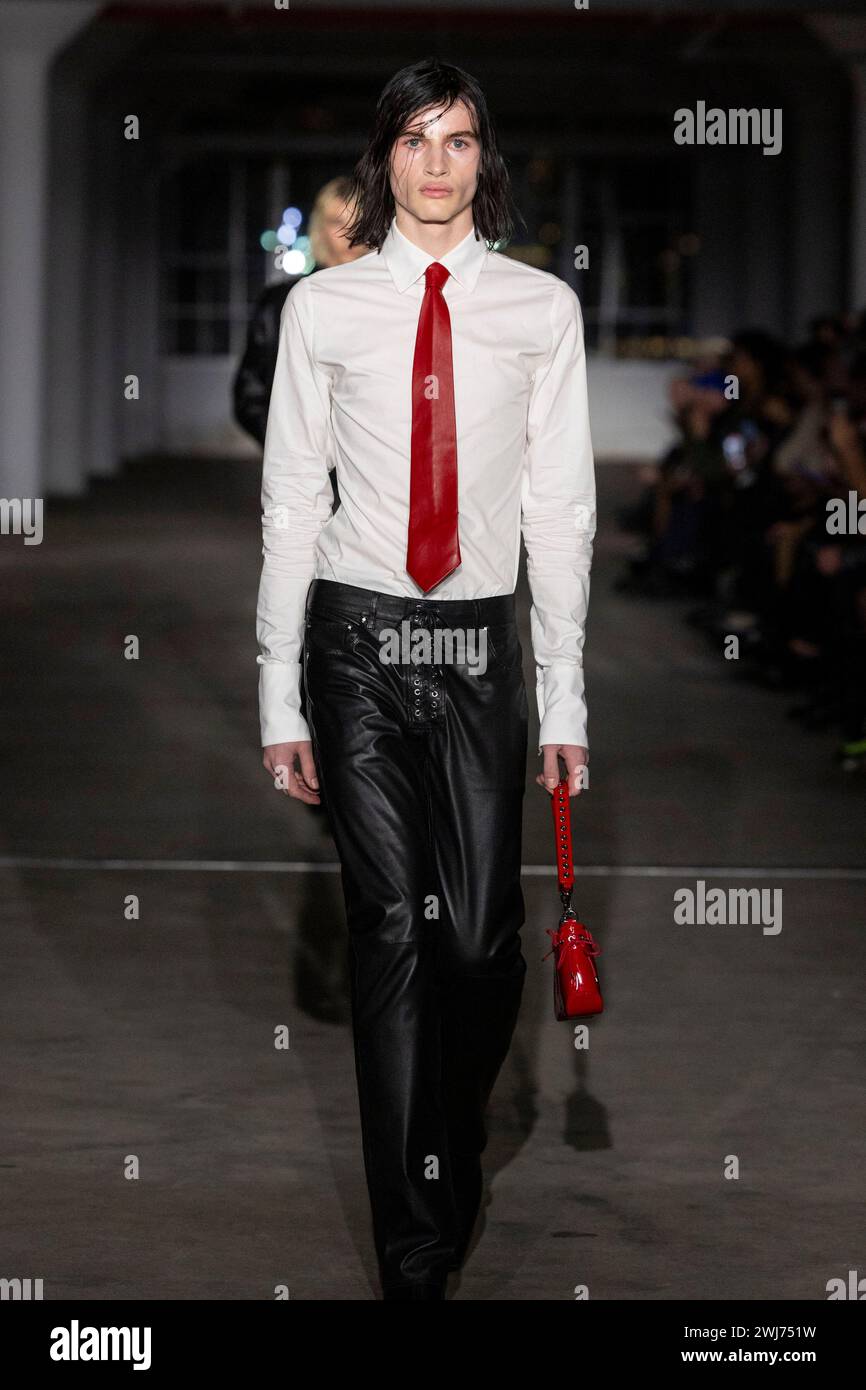 Model Cole Frederickson walks on the runway at the Ludovic de Saint ...