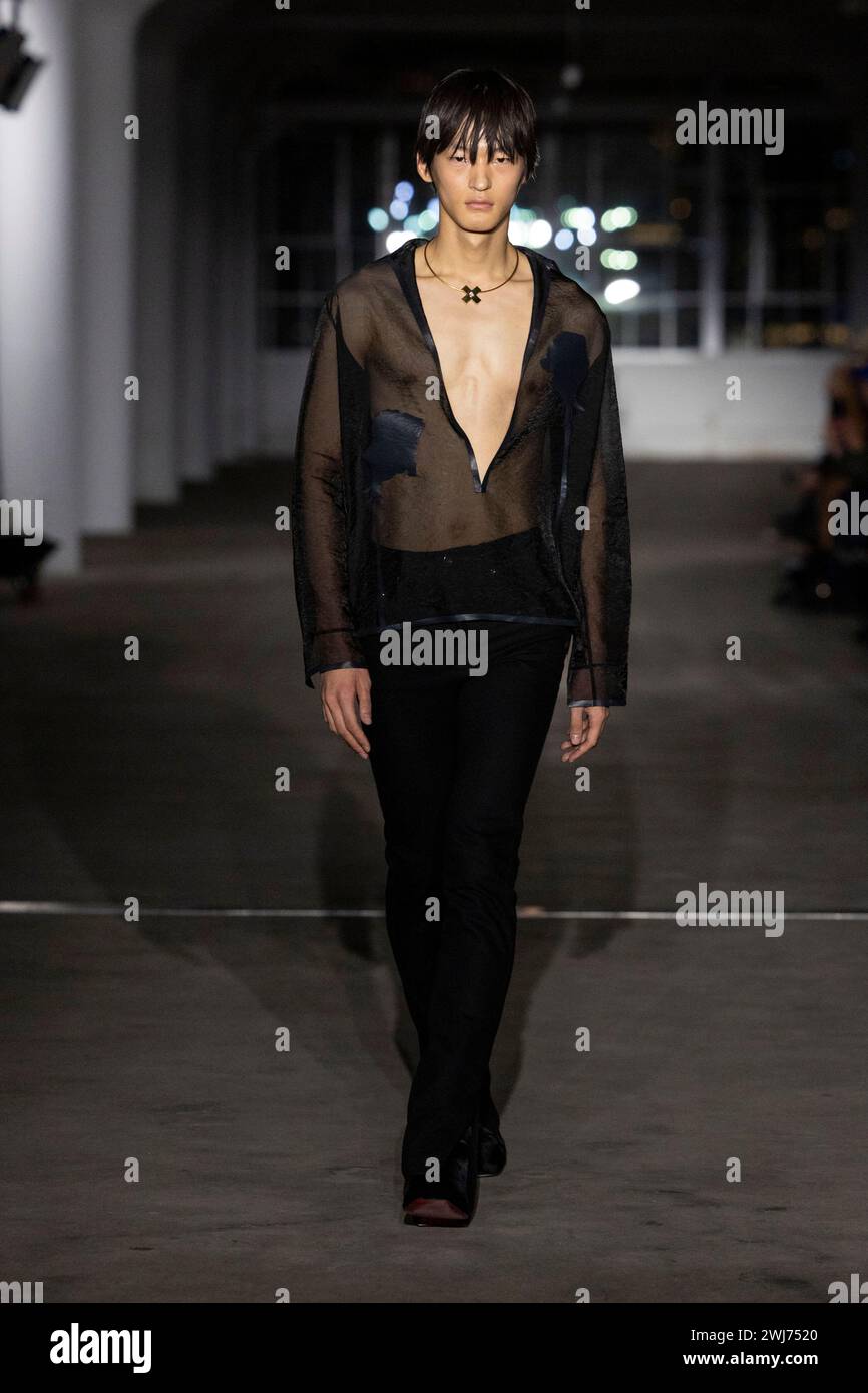 A model walks on the runway at the Ludovic de Saint Sernin fashion show ...