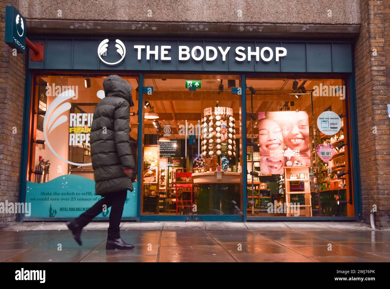 London, UK. 13th February 2024. A person walks past a Body Shop store ...