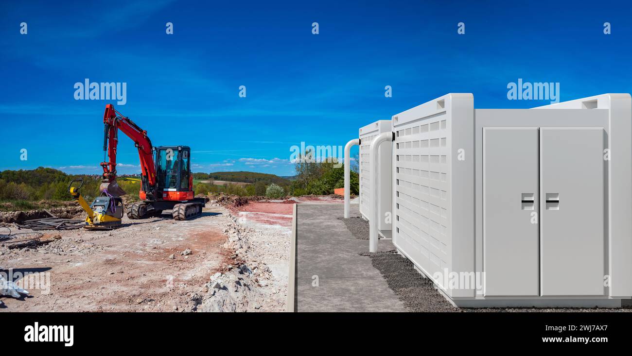 Construction machinery on a building site of a modern solarfield with ...