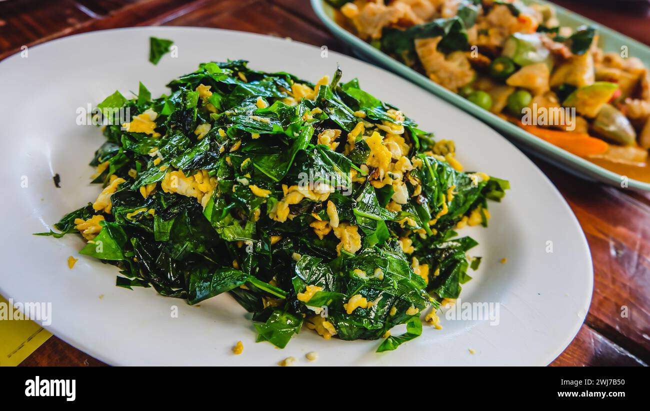 Southern Thai Food Menu Stir-Fried Malindjo Leaves with eggs (Thai name ...