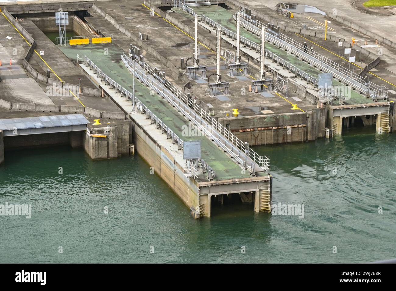 Colon, Panama - 22 January 2024: Heavy steel gate closing on one of the ...