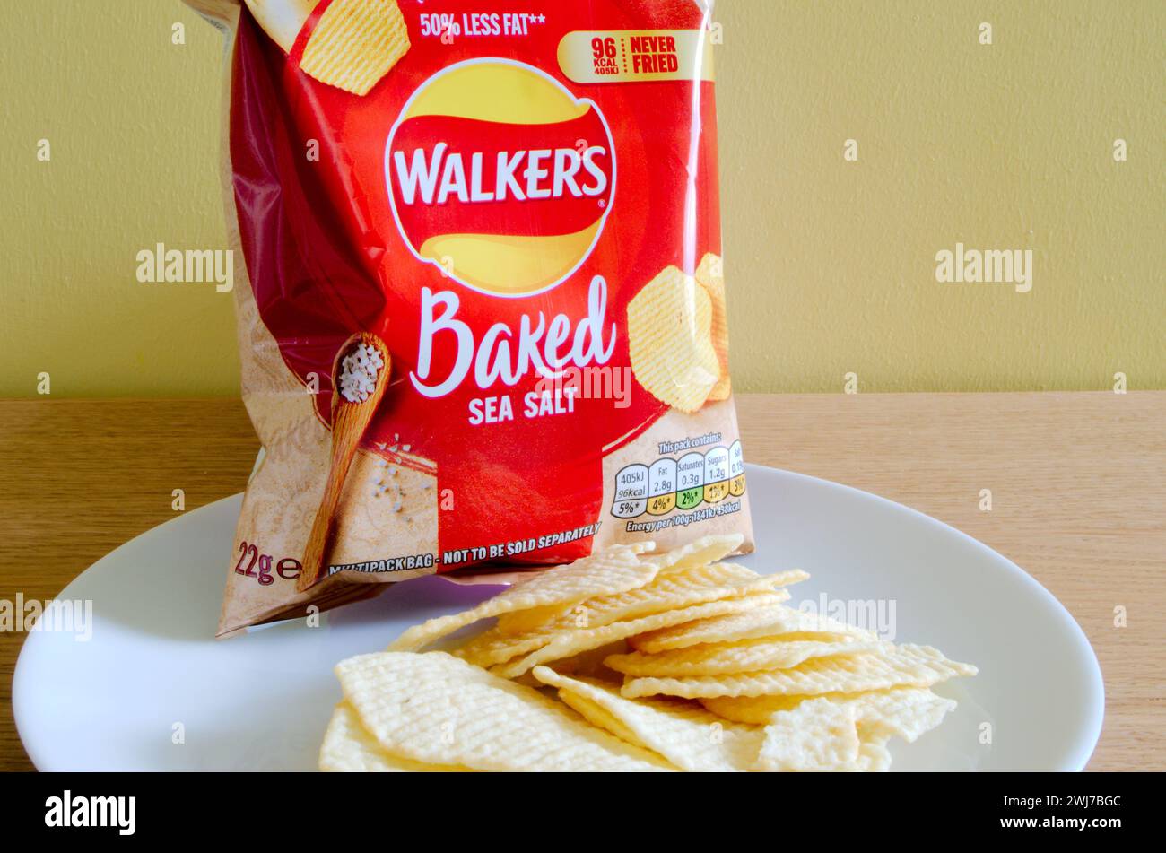 Packet or Bag of Walkers Baked Sea Salt Crisps Stock Photo - Alamy