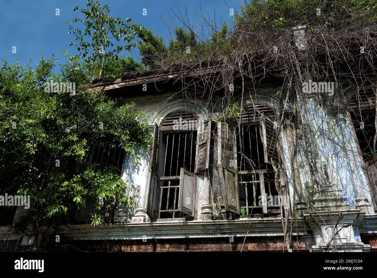 View of dilapidated and abandoned tin mining town of Papan in the ...