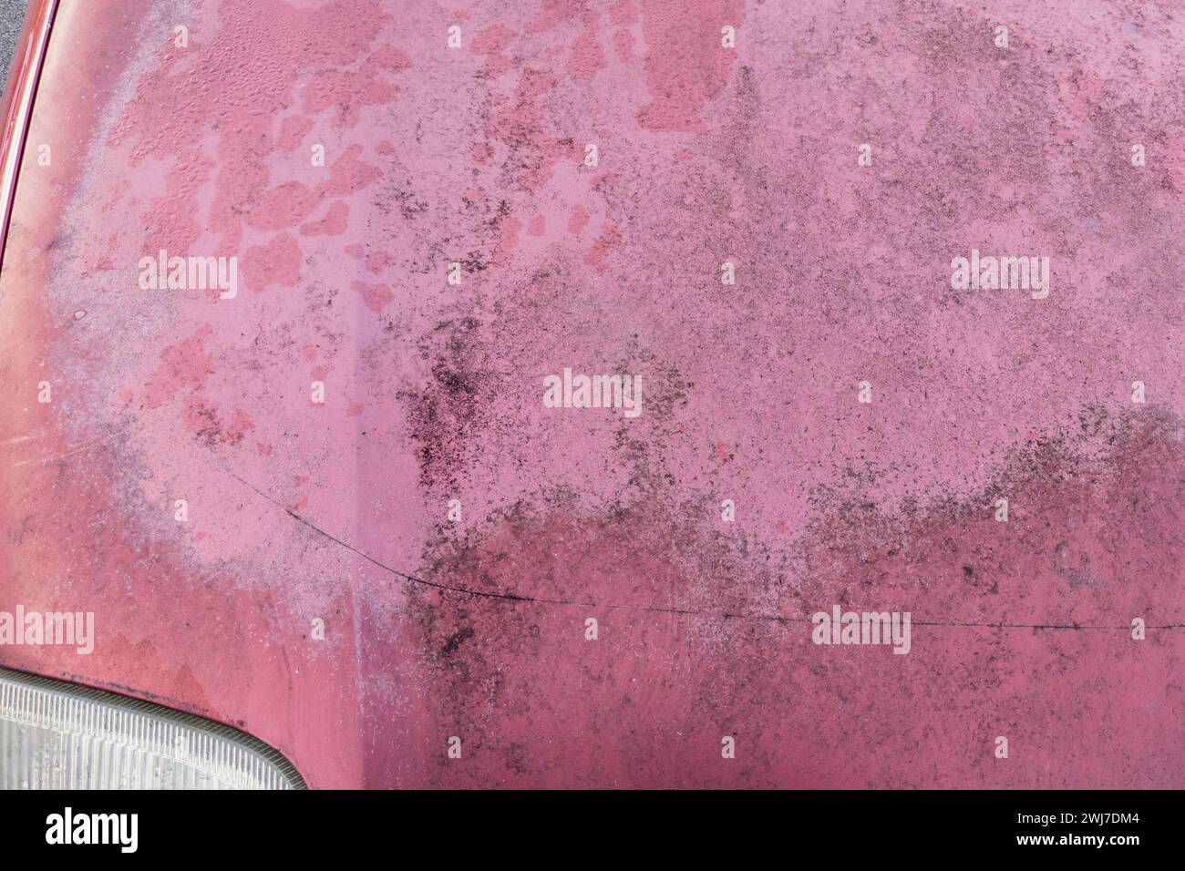 car dirty used peeling red pink paint on grunge pink hood of old ...