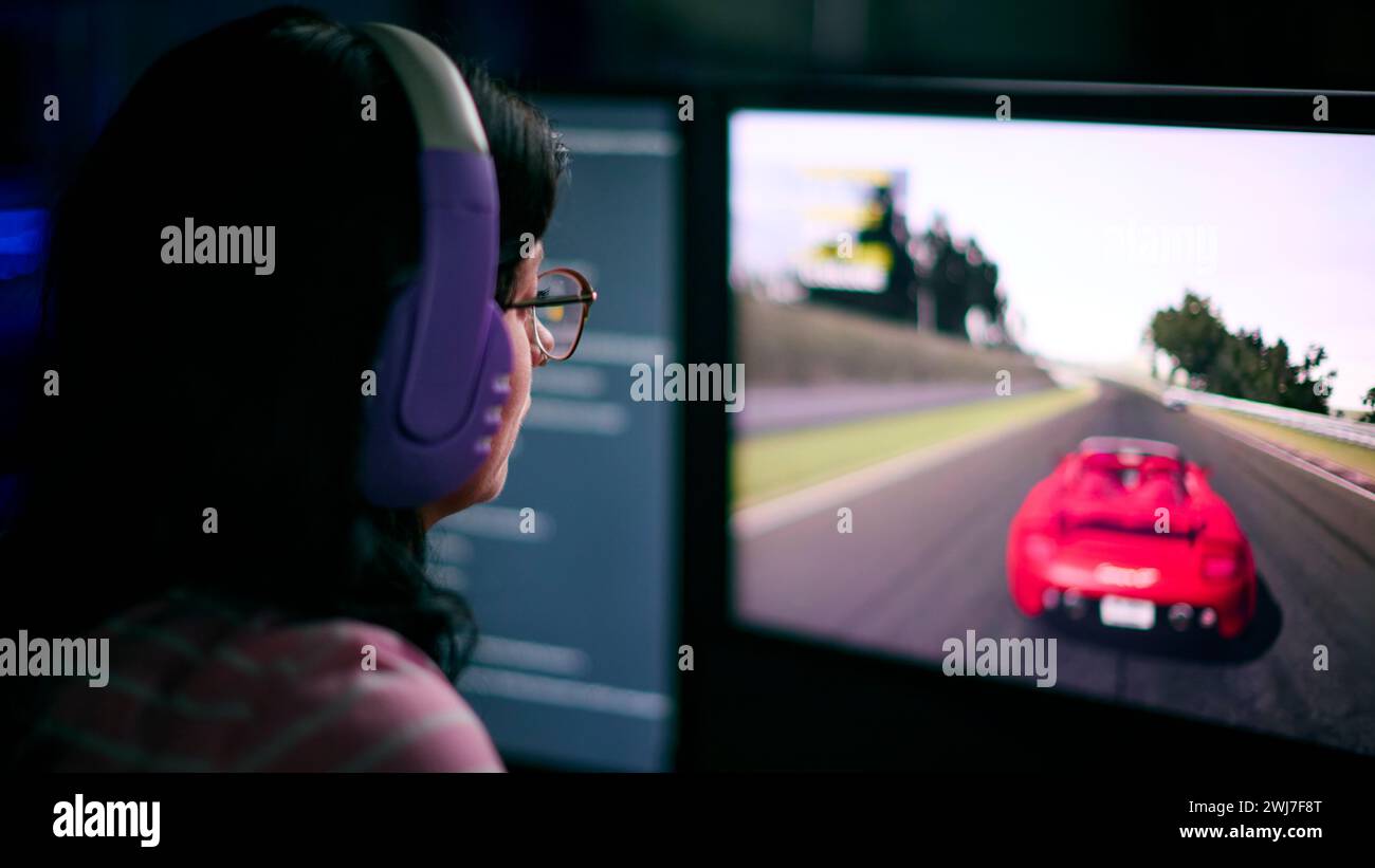 Close Up Of Female Gamer In Front Of Computer Screens With Headset ...