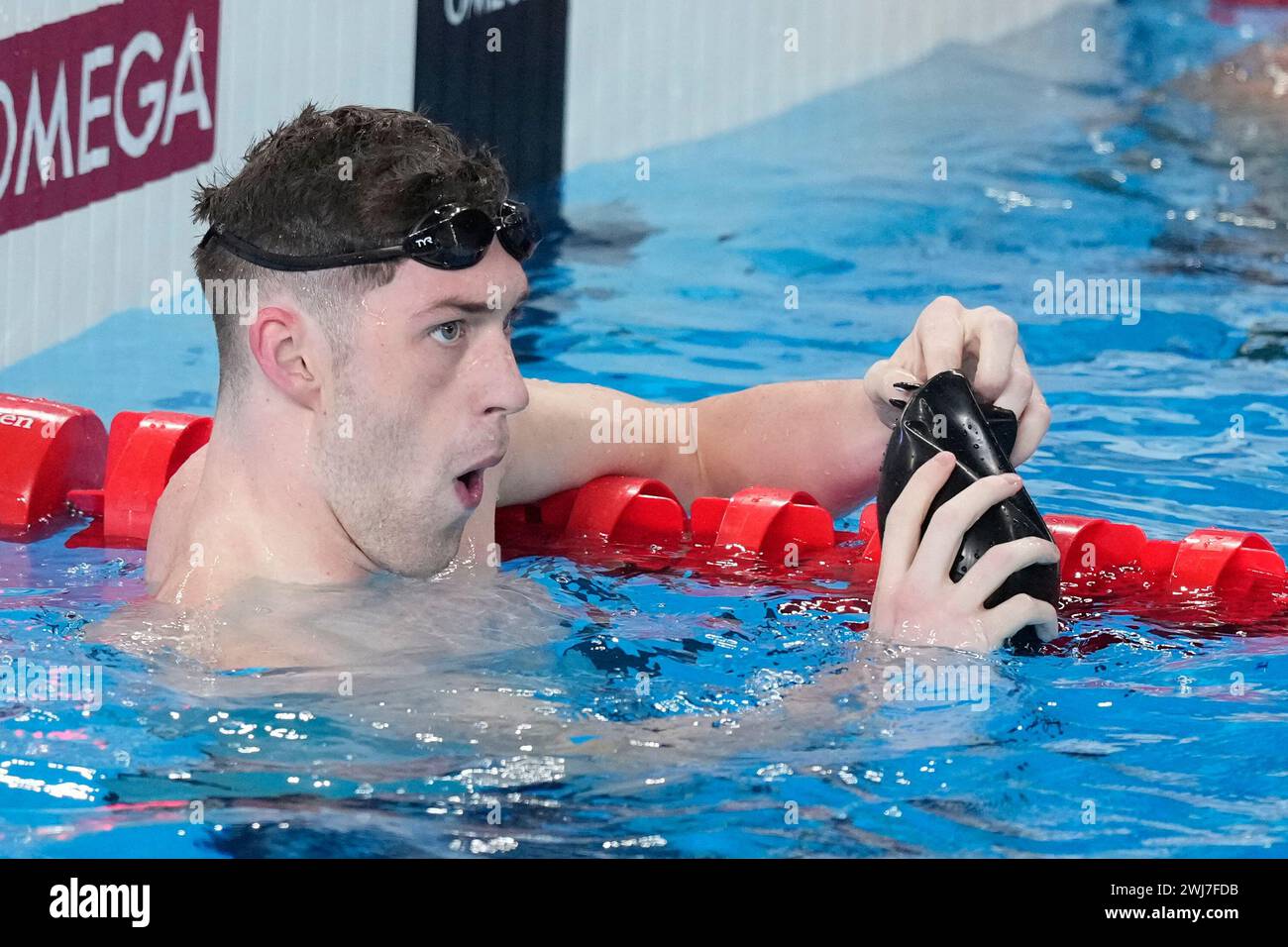 Hunter Armstrong of the United States reacts after competing in the men ...