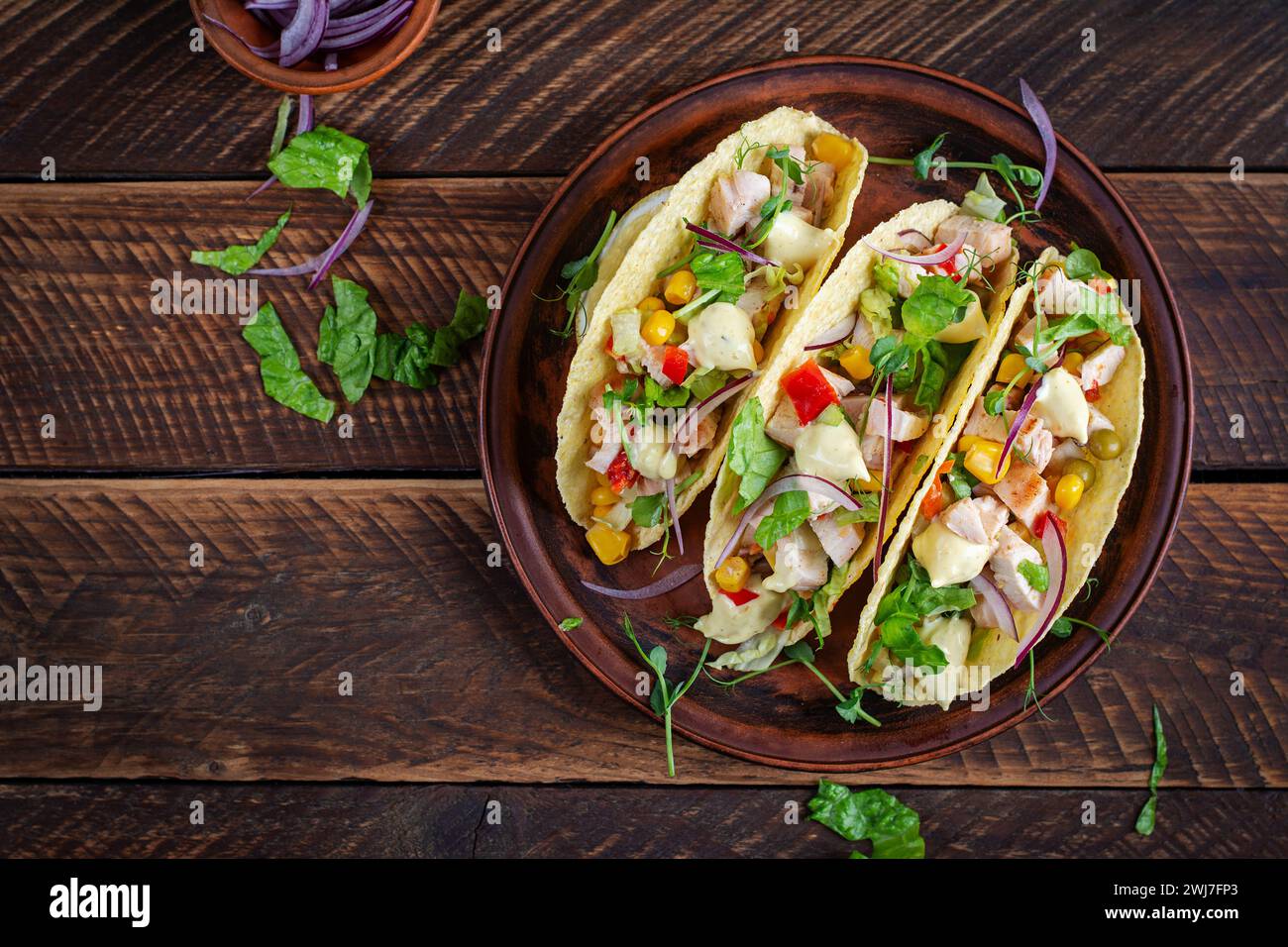 Mexican tacos with chicken meat, corn and salsa. Healthy tacos. Diet ...