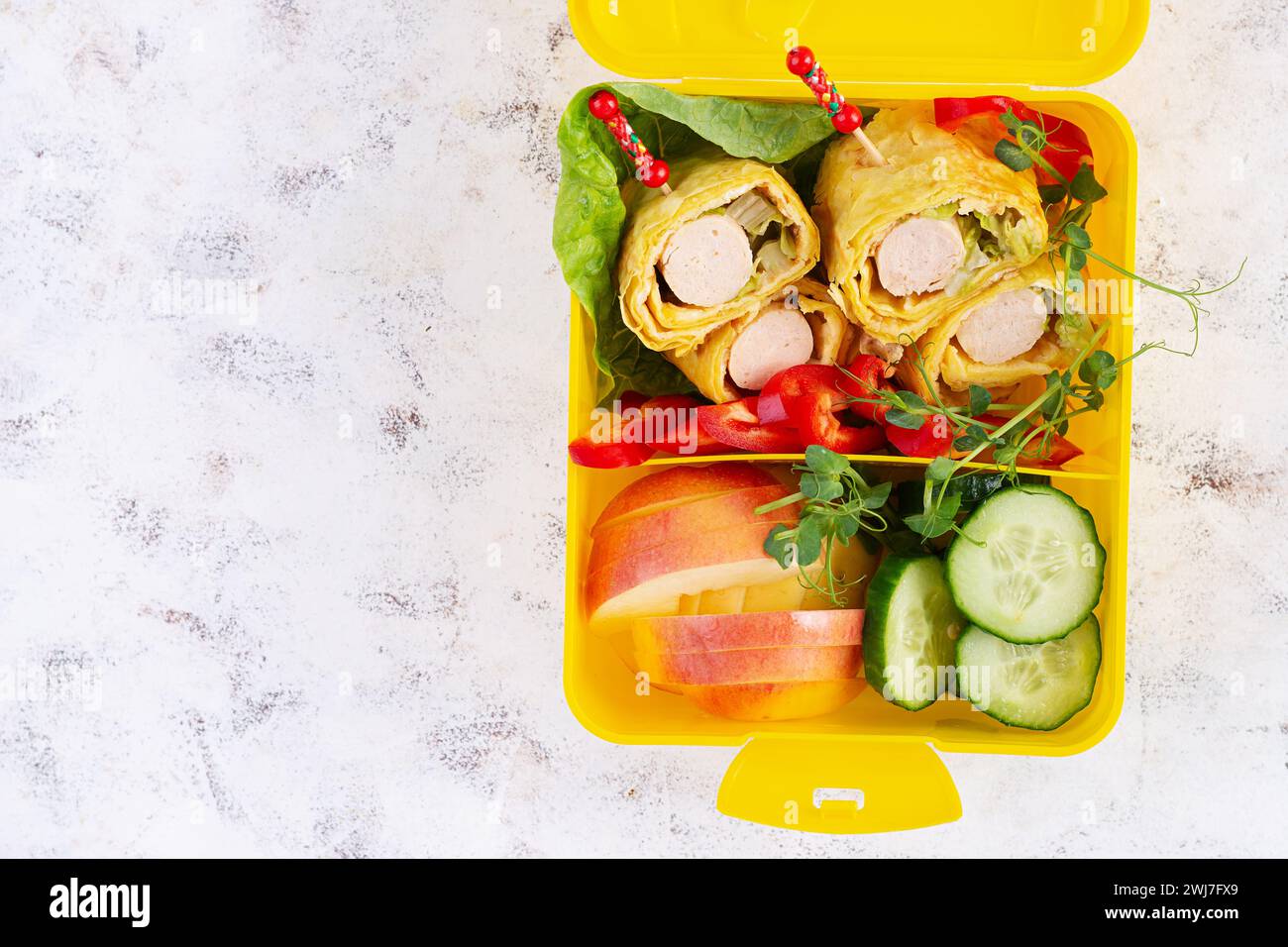 School lunch box with sausage roll in omelette with lavash. Lunchbox ...