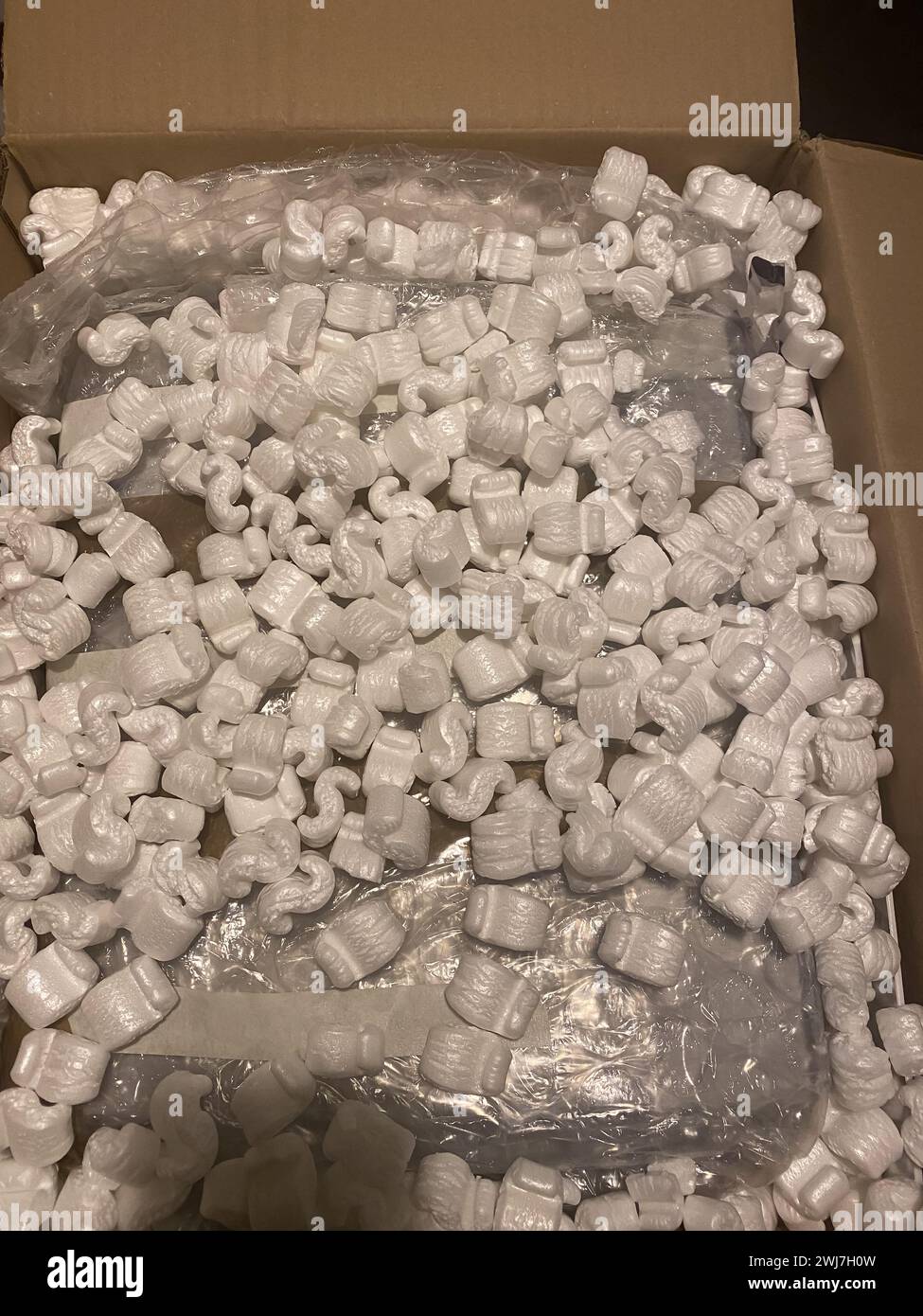 a cardboard box ready for shipping,foam inside to protect object ...