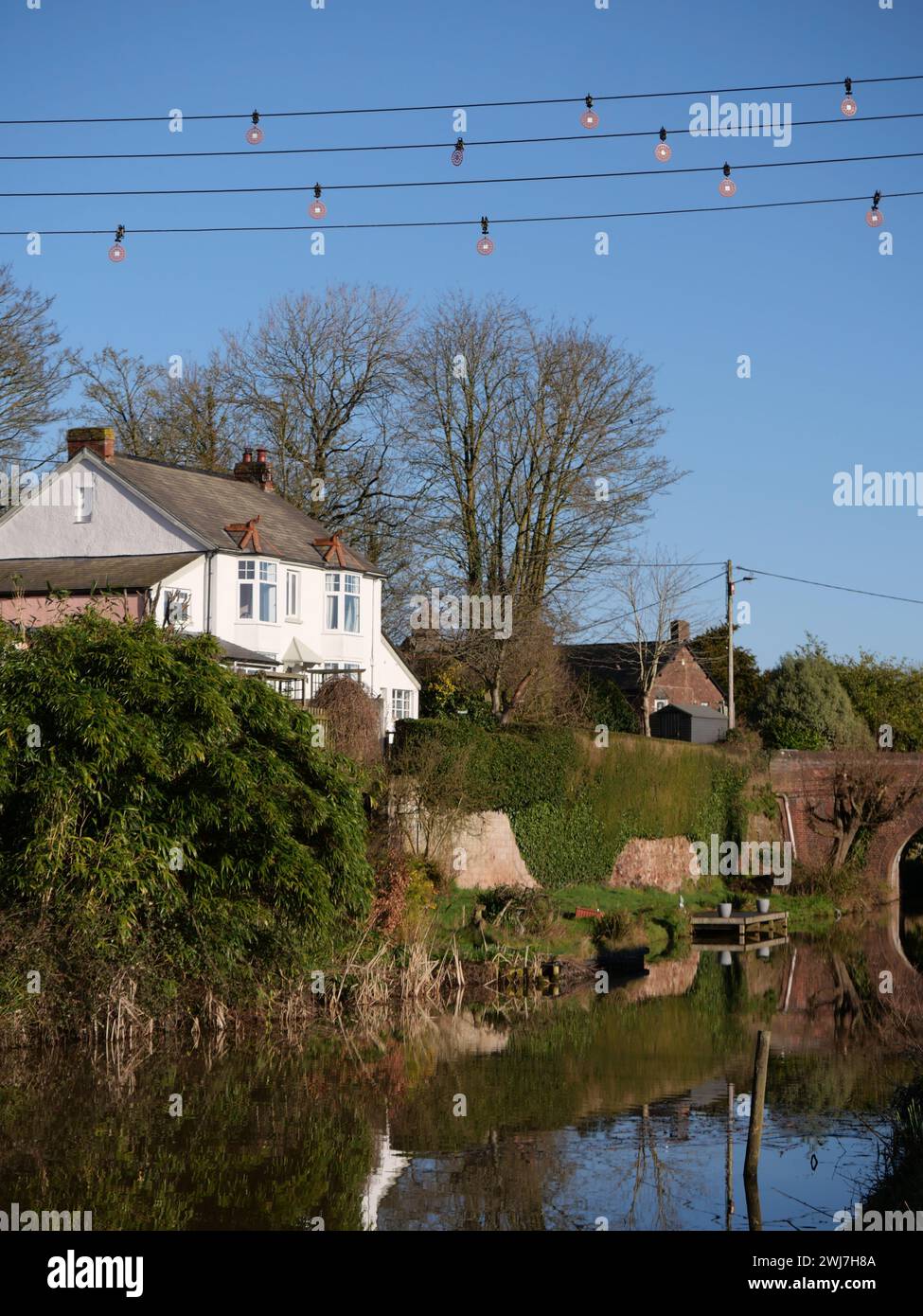 Bird flight diverters visibility markers hanging on power lines running ...