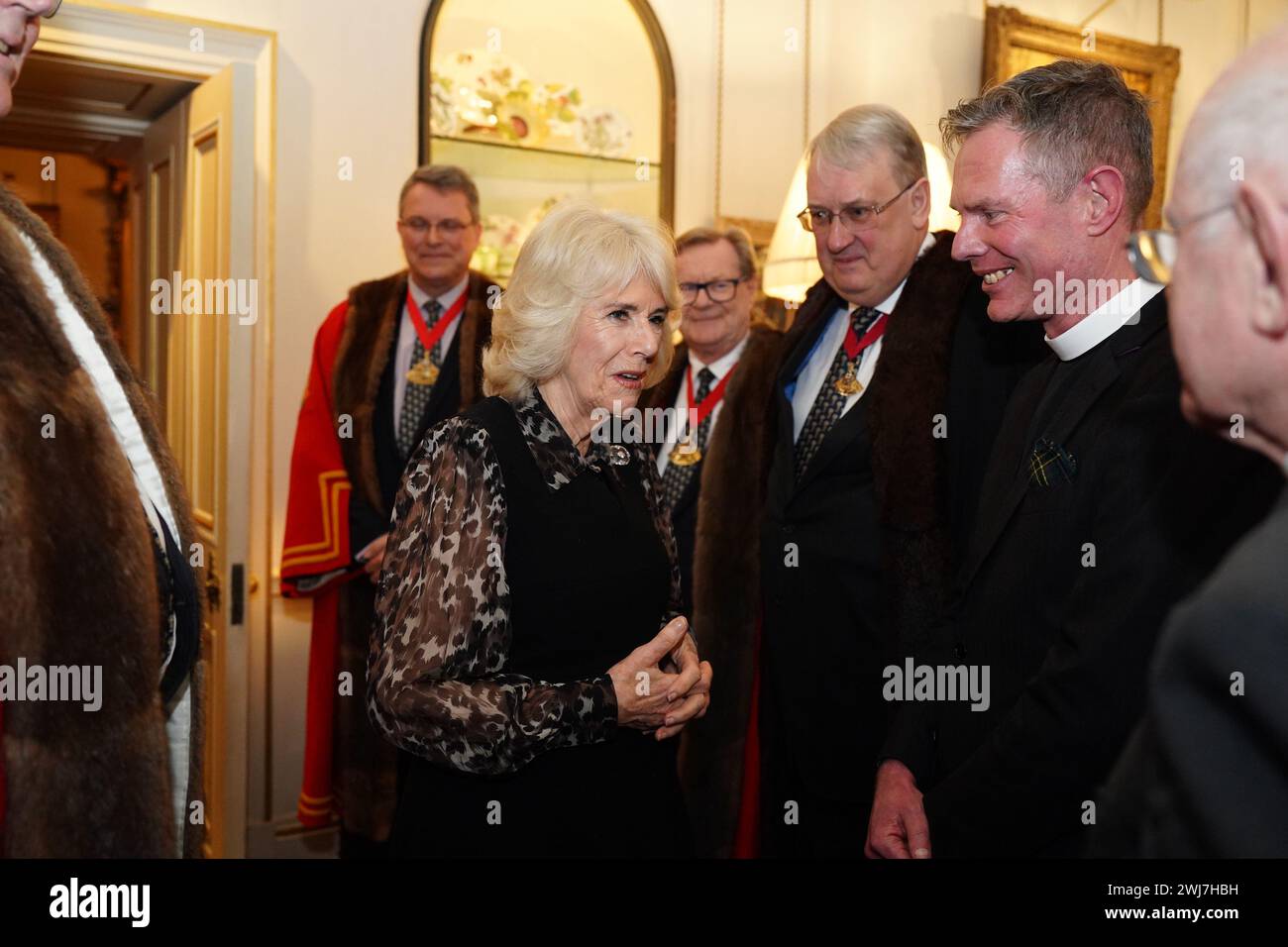 Queen Camilla greets fan makers ahead of a ceremony at Clarence House ...