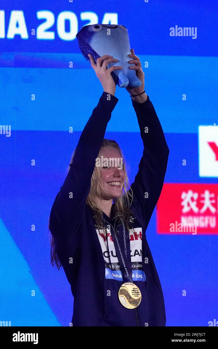 Gold medalist Claire Curzan of the United States reacts during the ...