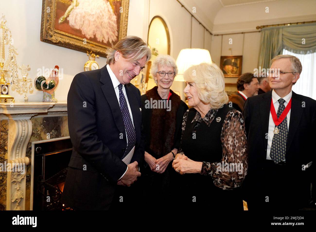Queen Camilla greets fashion designer Stewart Parvin ahead of a ...