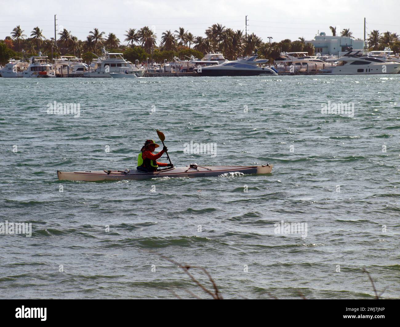 Miami, Florida, United States - January 27, 2024: Lady kayaking in the ...