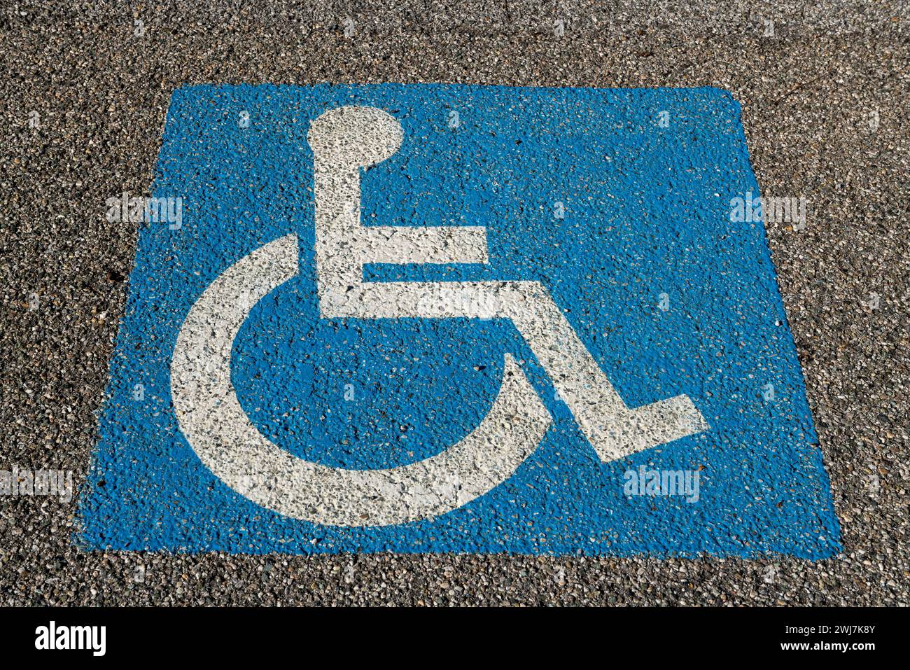 road symbol for disabled parking, white symbol on a blue field as per ...