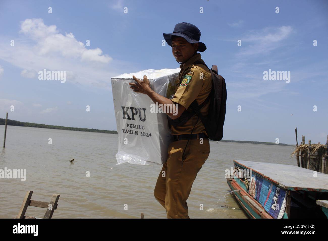 Langkat, Indonesia. 13th Feb, 2024. An official from the Jaring Halus ...
