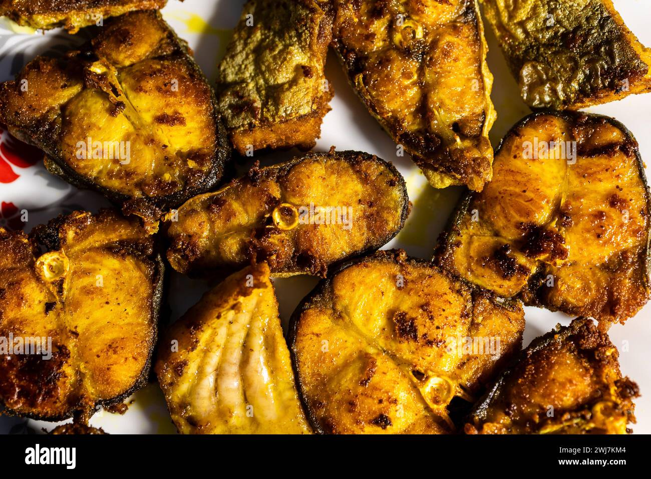 fried fish kept at white plat at home from different angle Stock Photo ...