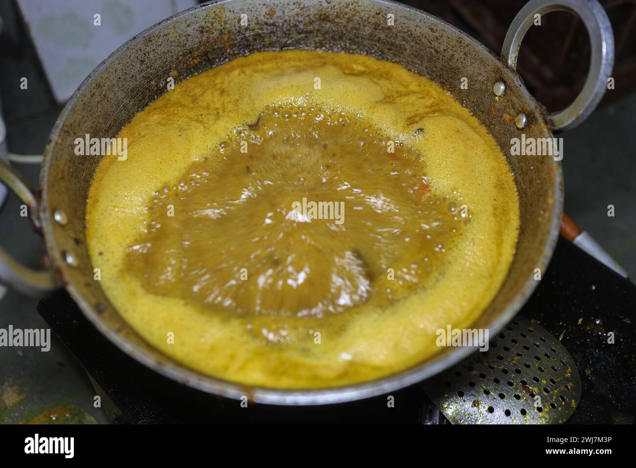 fresh cooked boiling fish gravy at cauldron at home at day Stock Photo ...
