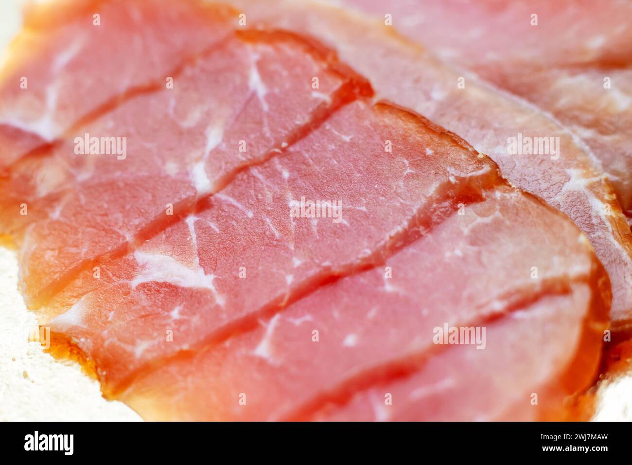 Red cuts of salted meat close up, macrophoto Stock Photo - Alamy