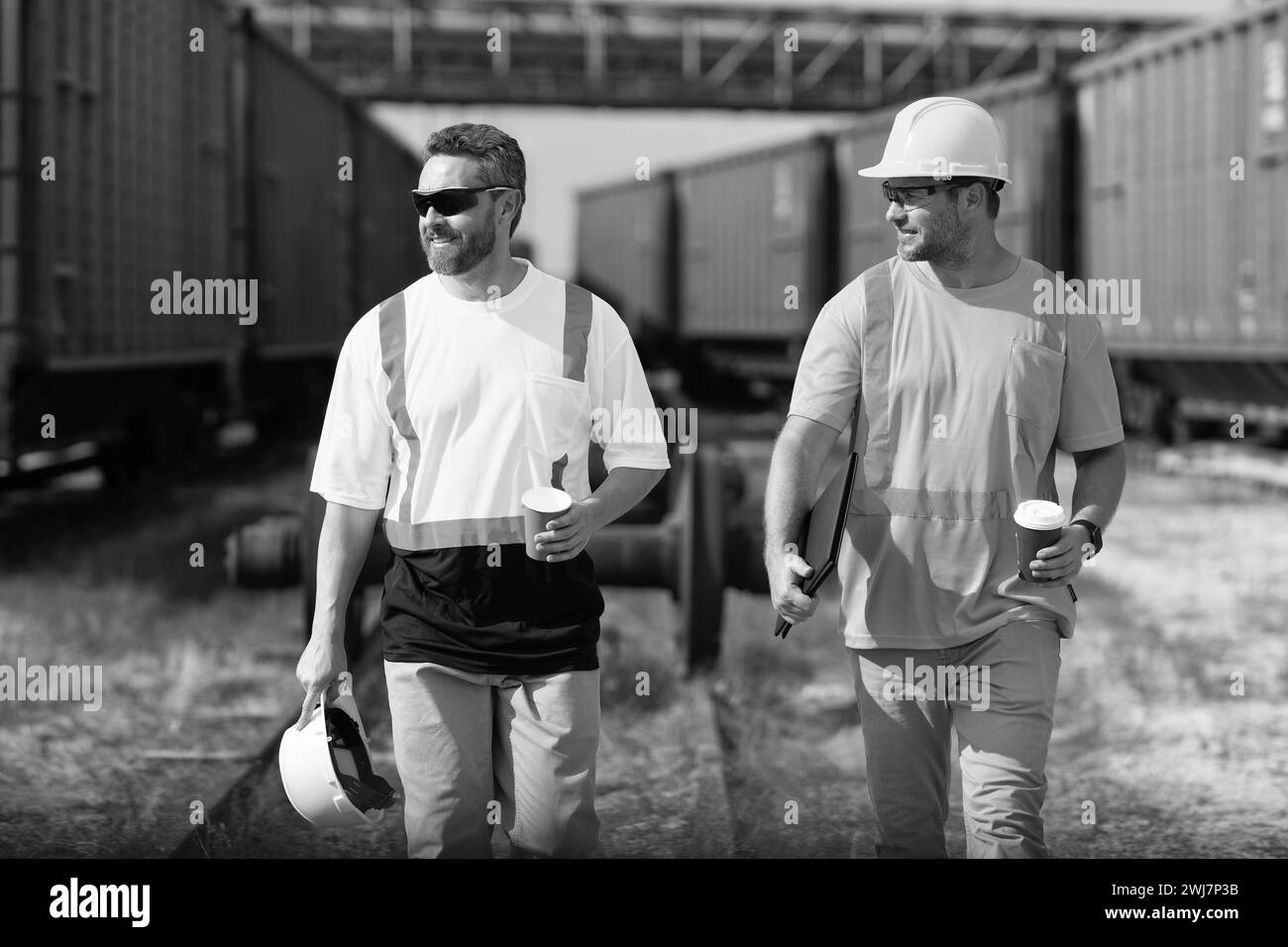 engineer men at construction site having coffee break. engineer men at ...